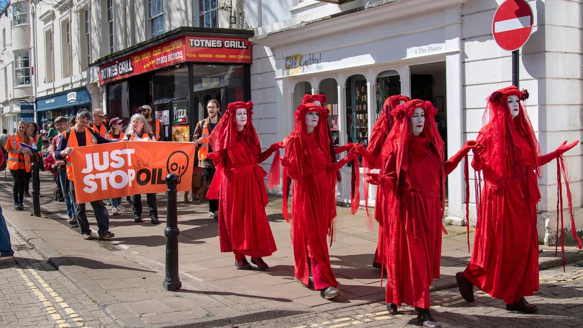 Red Rebels unite with Totnes climate activists | southhams-today.co.uk