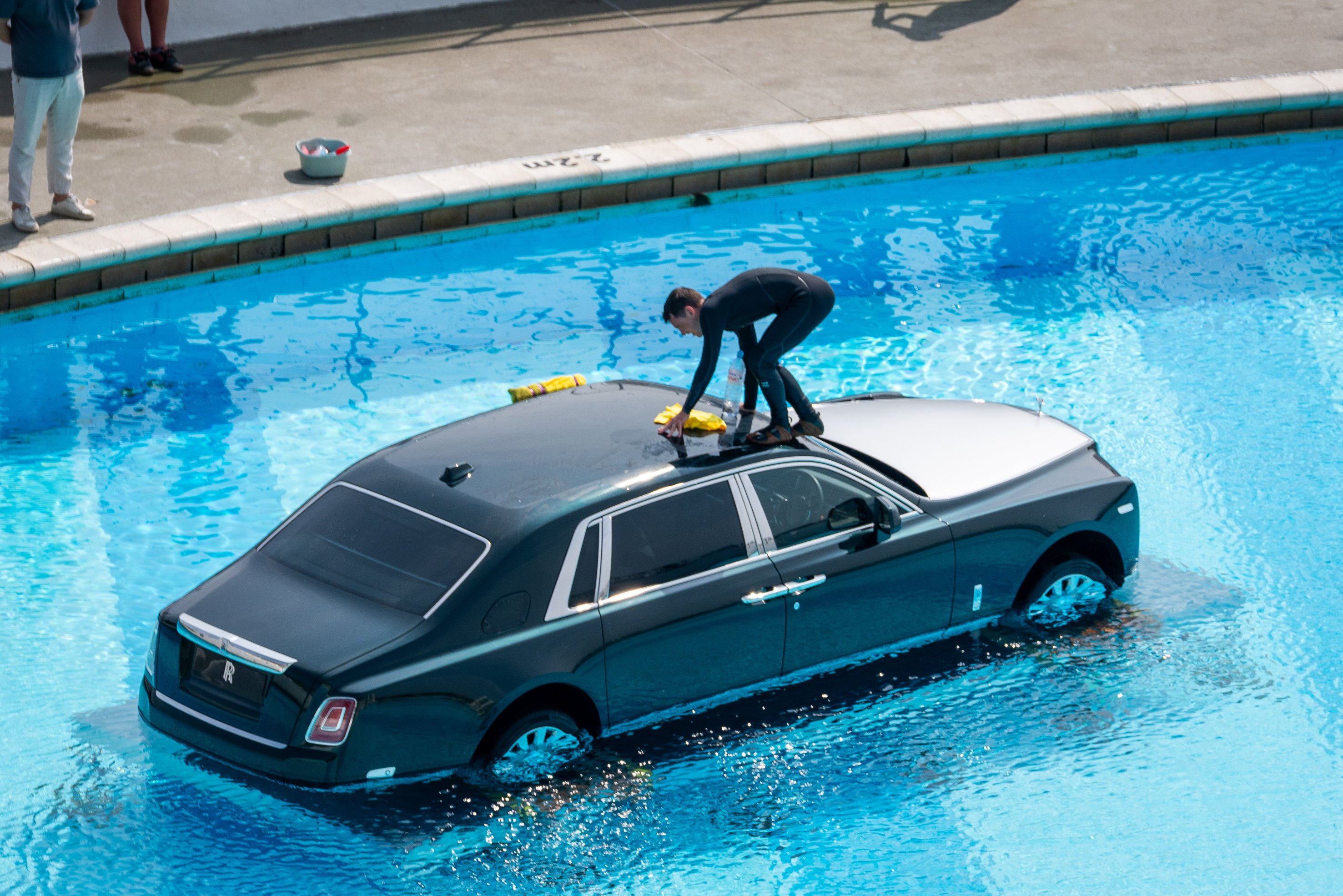 Rolls Royce lowered into swimming pool was 'in honour of’ rock legend ...